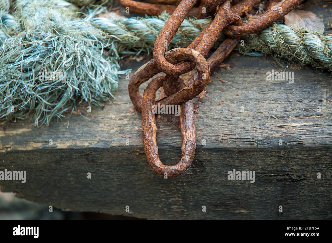 Rusted chains and weathered textures Stock Photo - Alamy