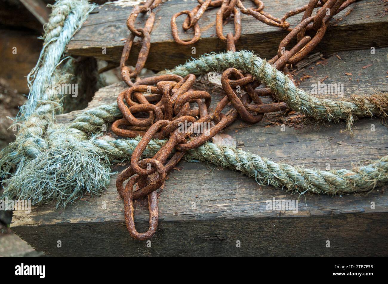 Rusted chains and weathered textures Stock Photo - Alamy