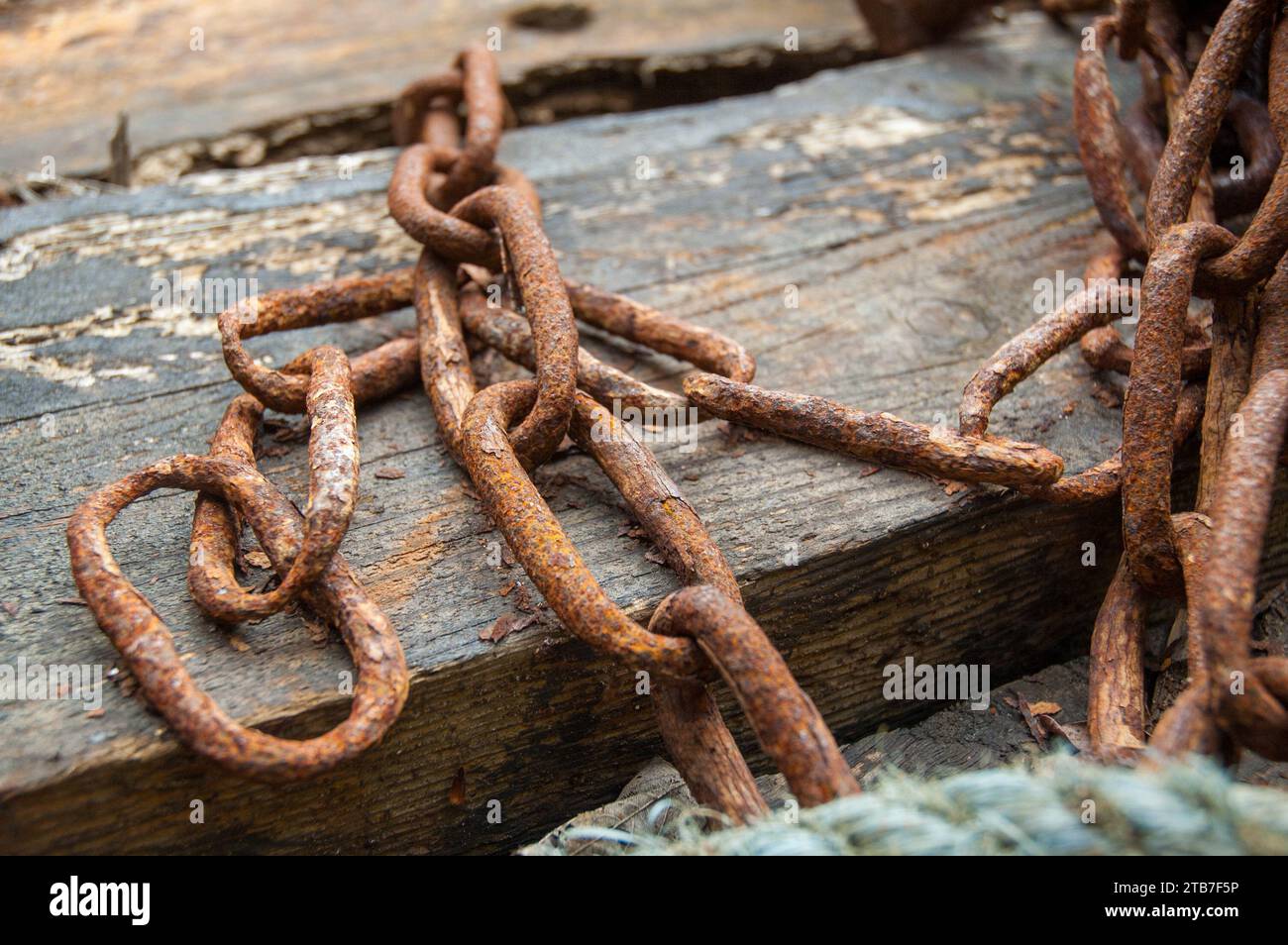 Rusted chains and weathered textures Stock Photo - Alamy