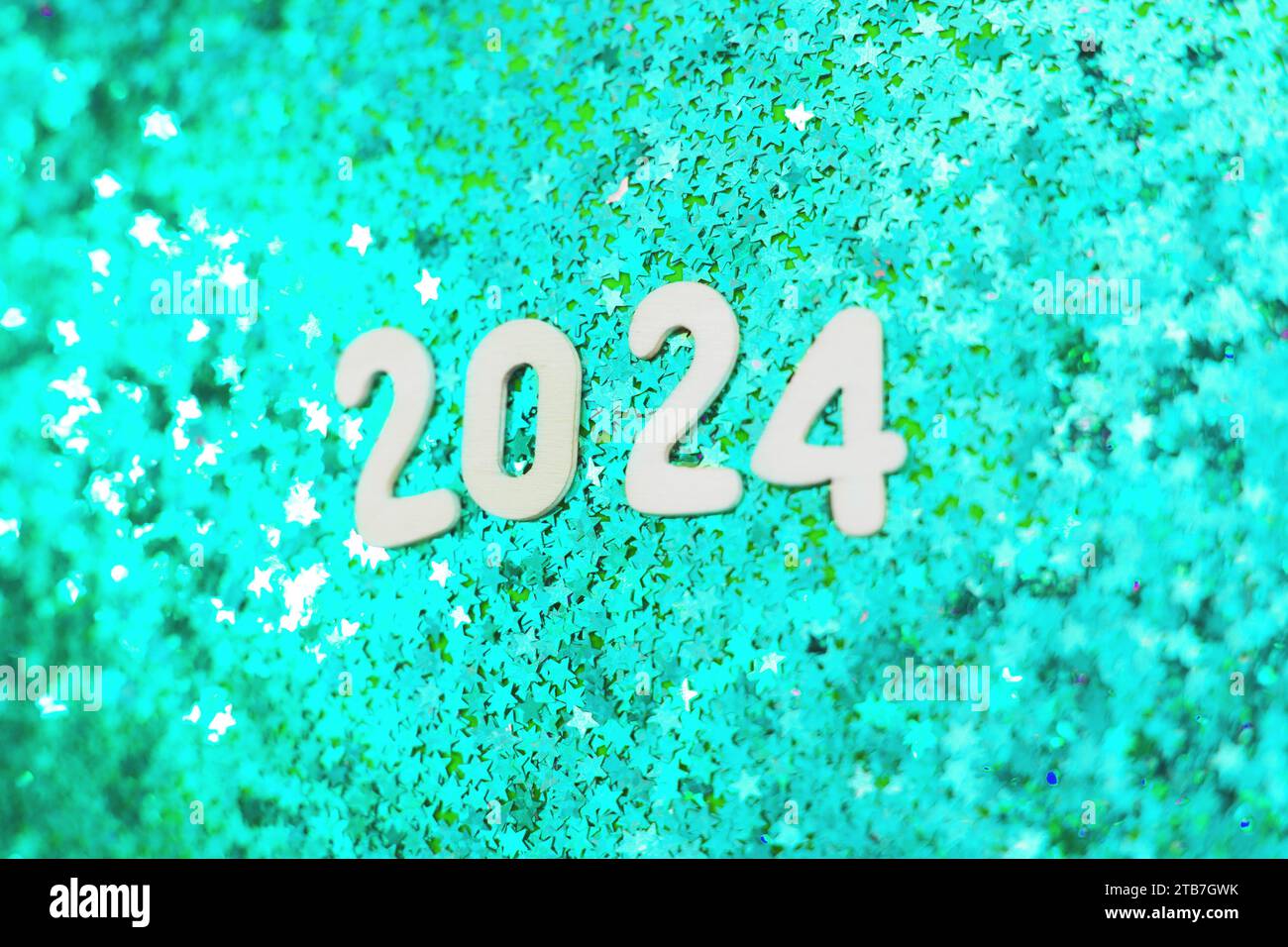 wooden number 2024 on christmas shiny background with sparkle festive ...