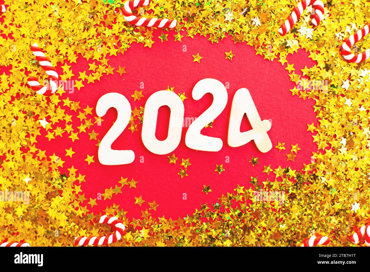 wooden number 2024 on christmas shiny red background with sparkle ...