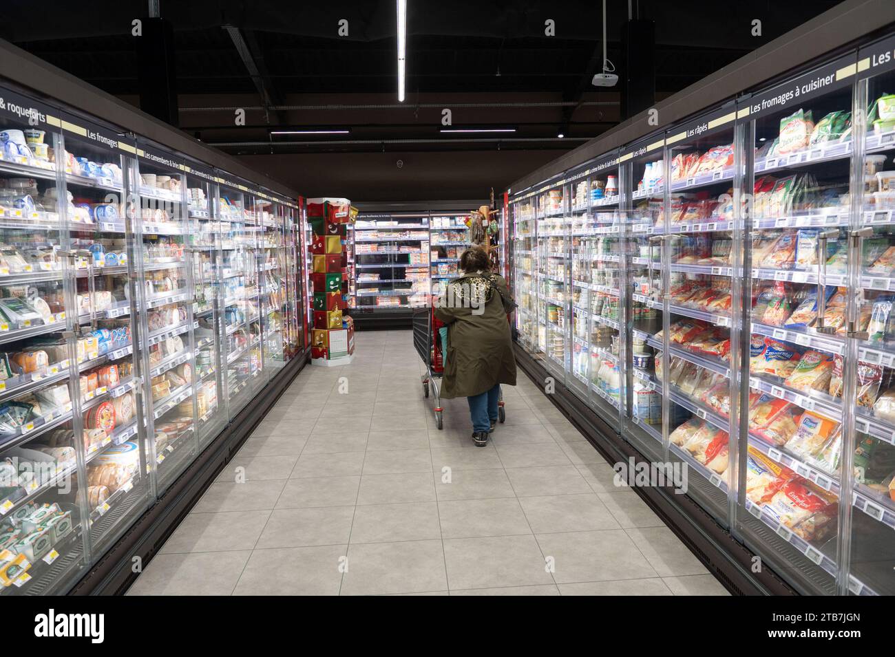 Intermarche supermarket: refrigerated cabinets in the cheese section ...