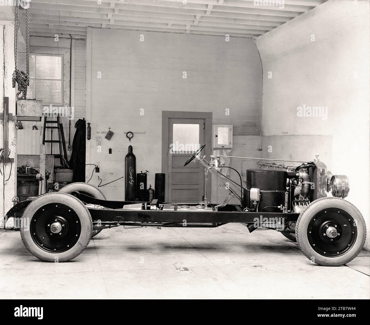 Doble chassis in garage, side view - Vintage car picture Stock Photo ...