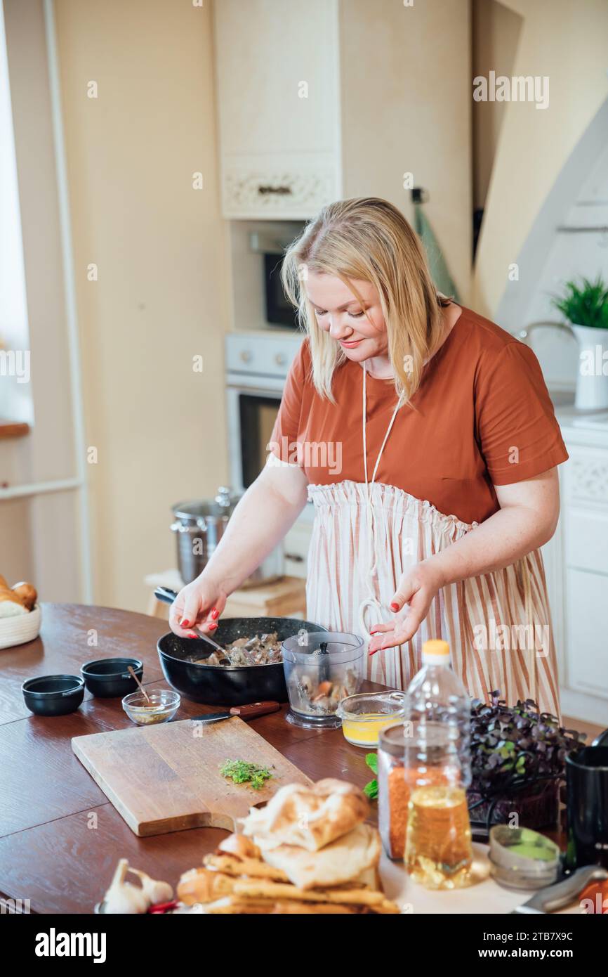 Woman cooking bolognese sauce female hi-res stock photography and ...
