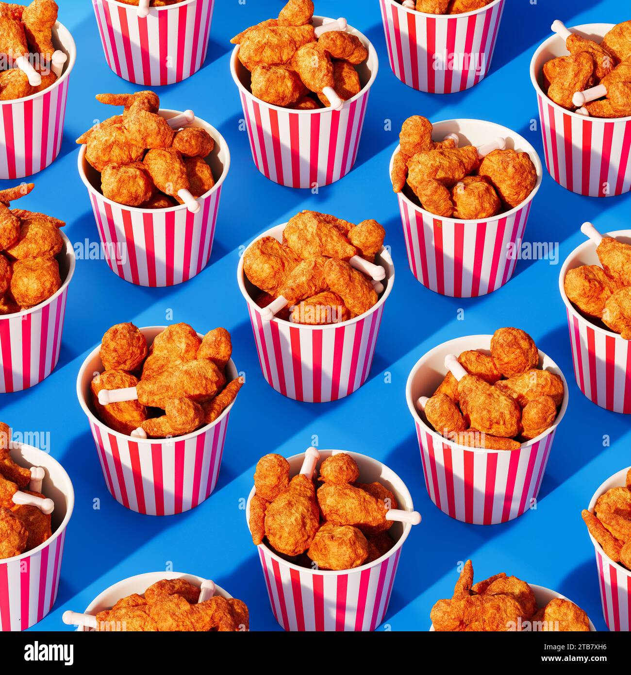 Delectable fried chicken heaps artfully presented in red and white ...