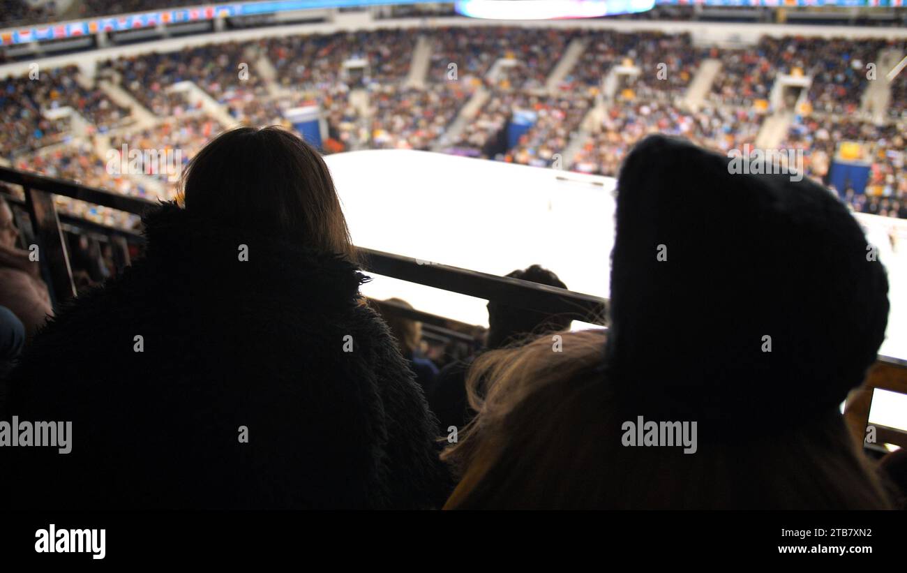 Fans sit and clap their hands on the ice arena during the World Cup in ...