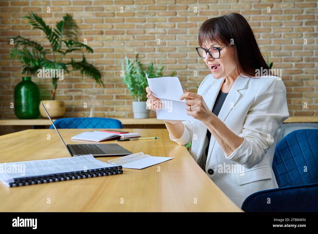 Woman bank statement mature hi-res stock photography and images - Alamy