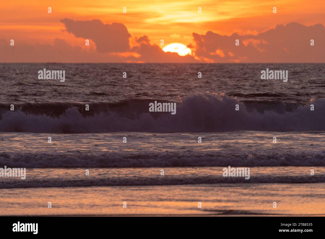 Sunset on the beach in Seminyak, Bali Island, Indonesia Stock Photo - Alamy