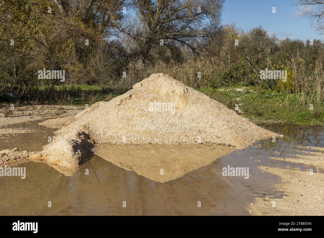 Landscape with a mound of sand Stock Photo - Alamy