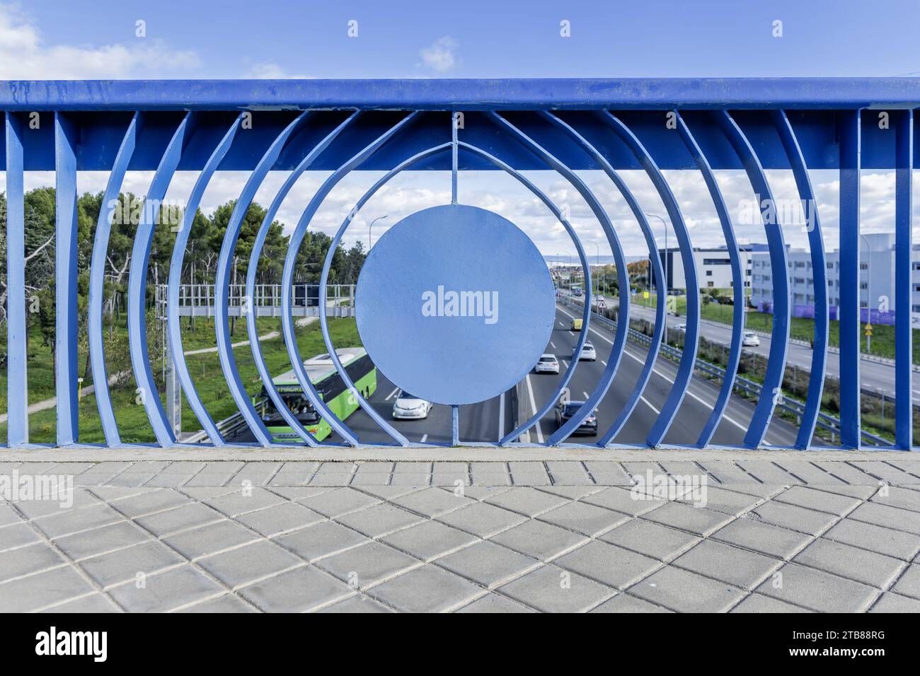 blue painted metal railing with peculiar shapes Stock Photo - Alamy