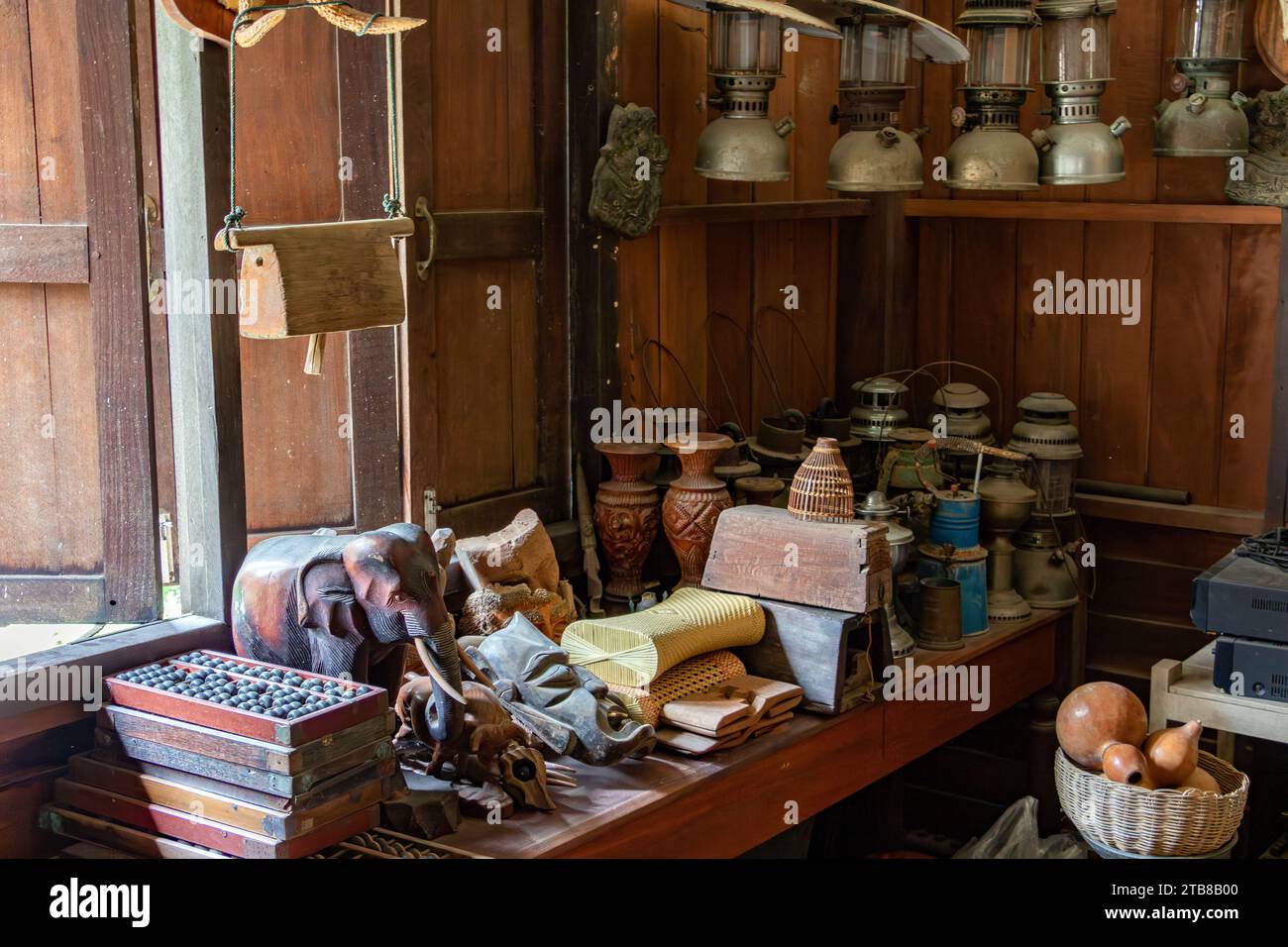 Dusty equipment and collections in a room with open windows Stock Photo ...