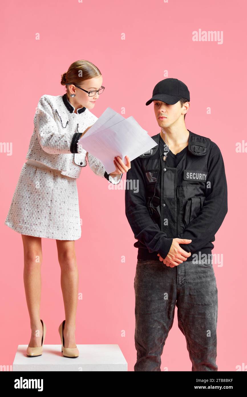 Bodyguard in training, this security guard is learning the ropes from ...