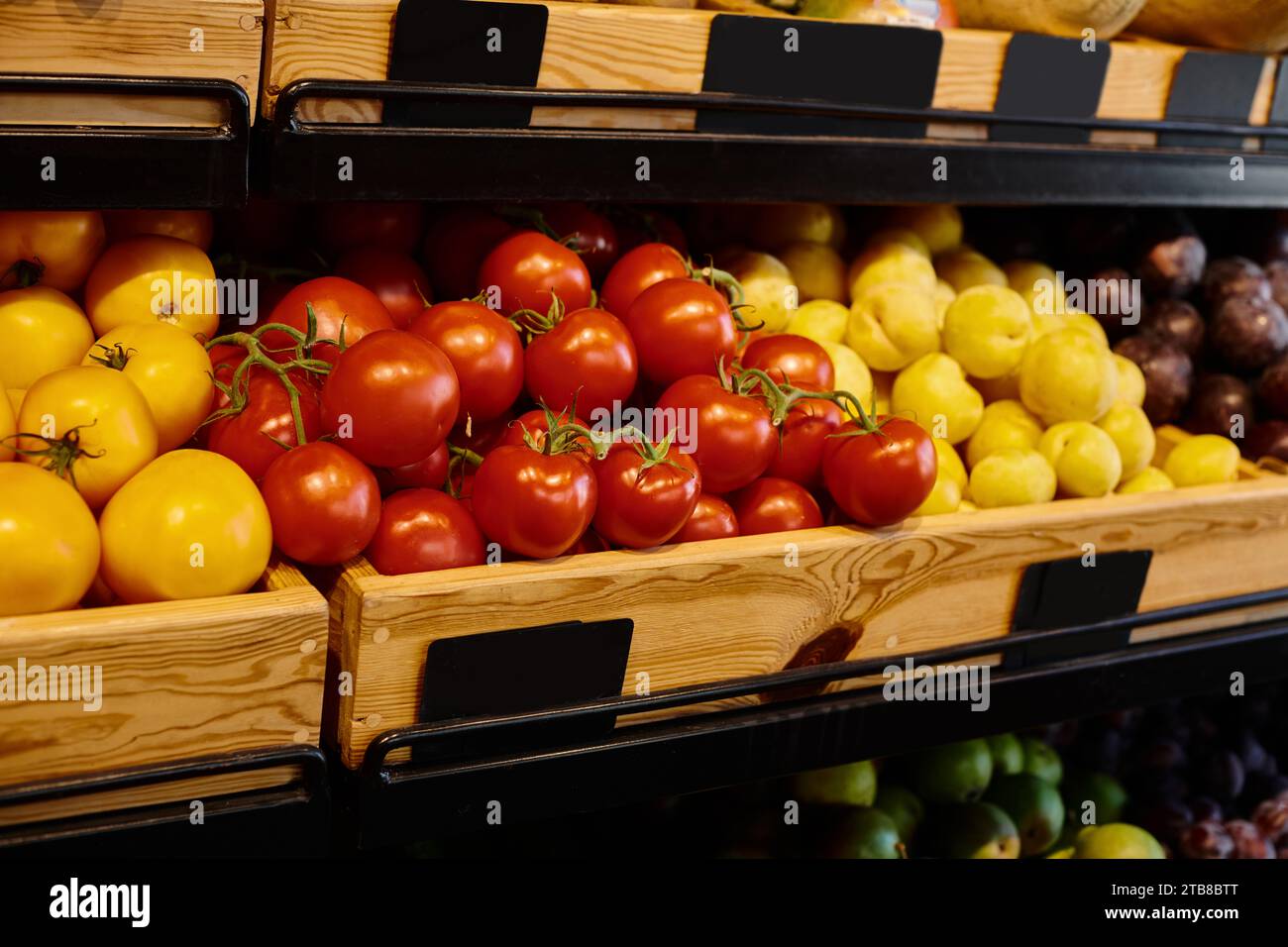object photo of bright vegetable stall with fresh red and yellow ...