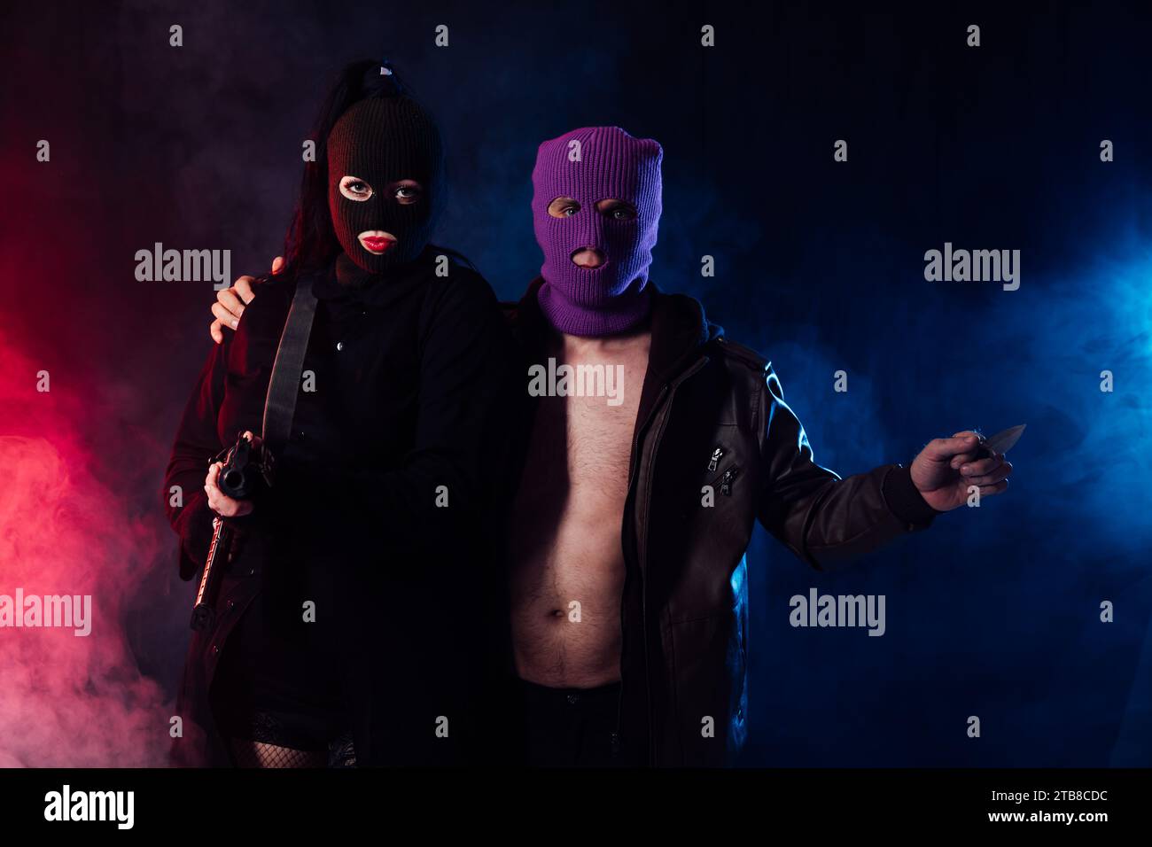 masked terrorists with weapons in the smoke Stock Photo - Alamy