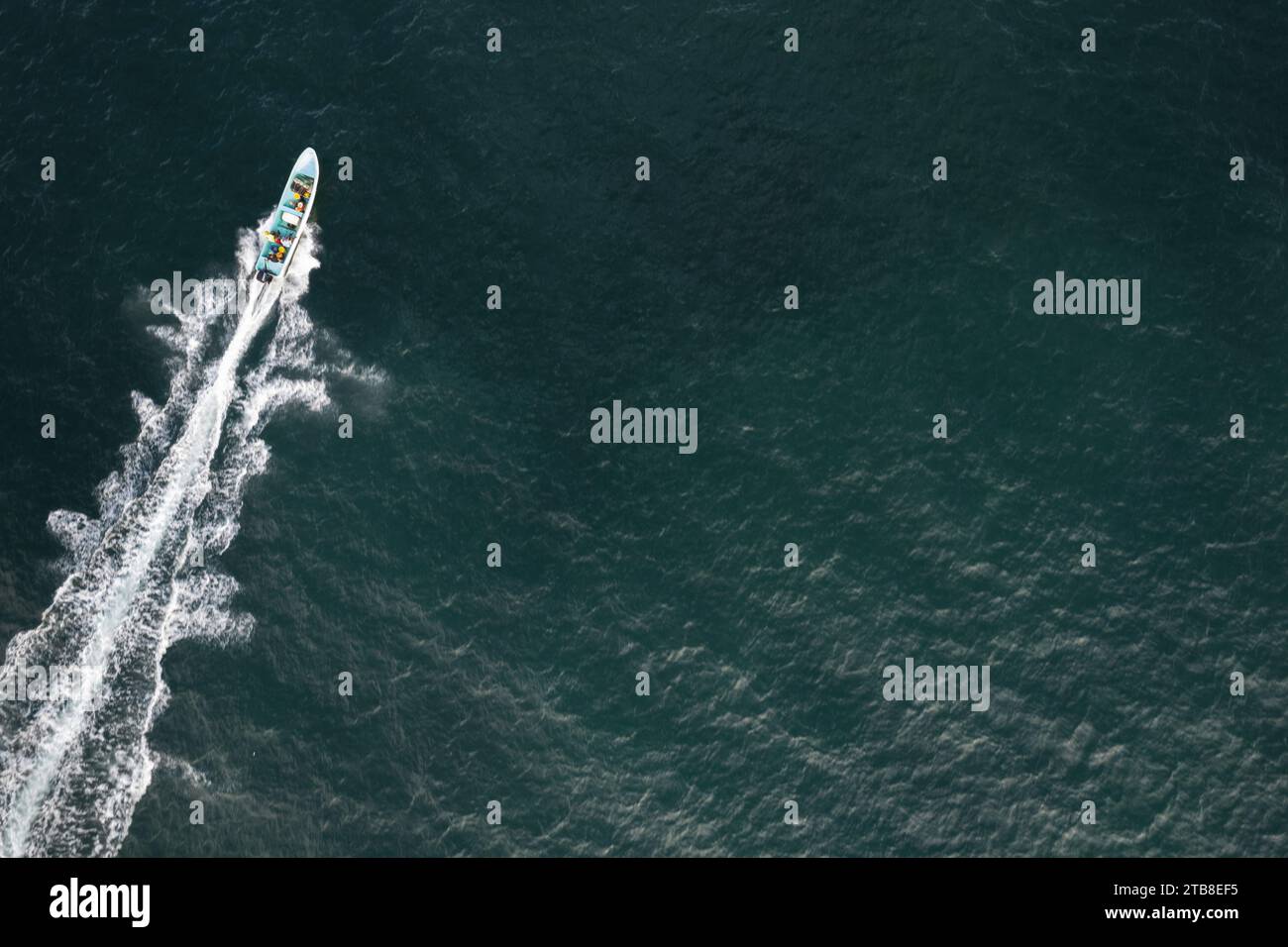 Fishing hobby theme. Going on small to catch fish in green sea aerial ...