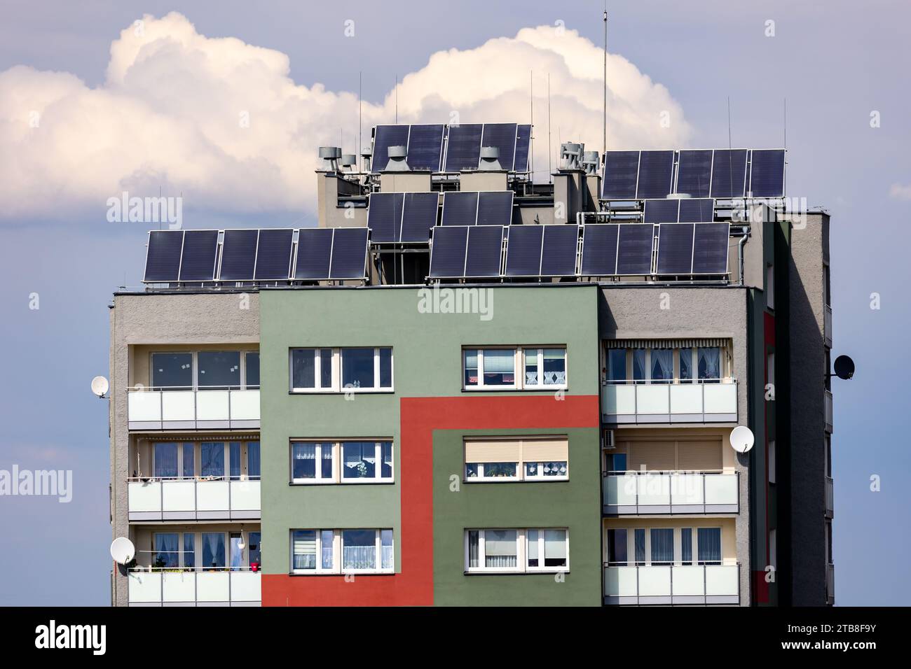 Photovoltaic, solar panels on the roof of a residential block ...