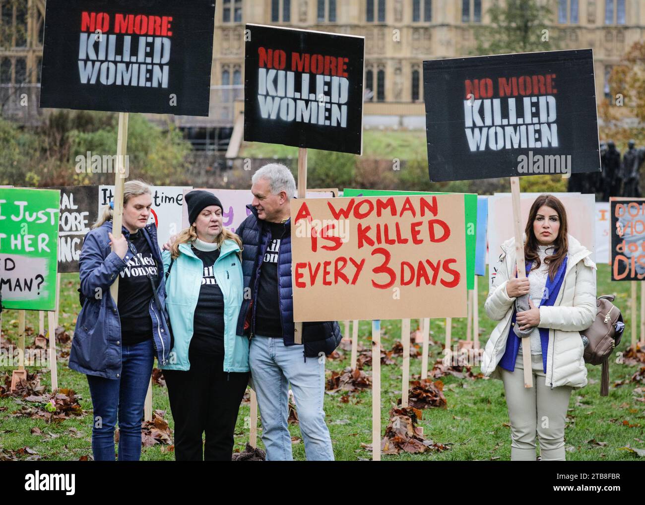 London, UK 05th Dec 2023. Affected and bereaved families stand with an ...