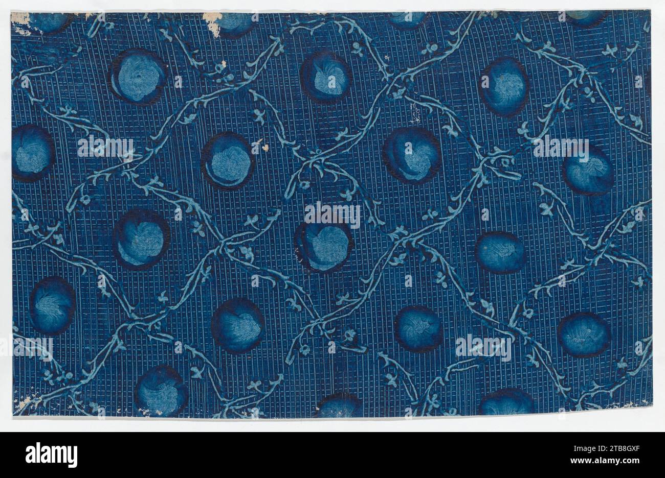 Blue paste paper with circular designs and ornamental diagonal pattern ...