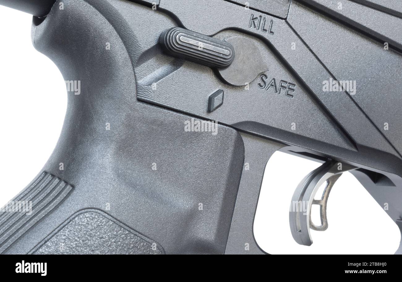 Safety engaged but a position above it is the kill position Stock Photo ...