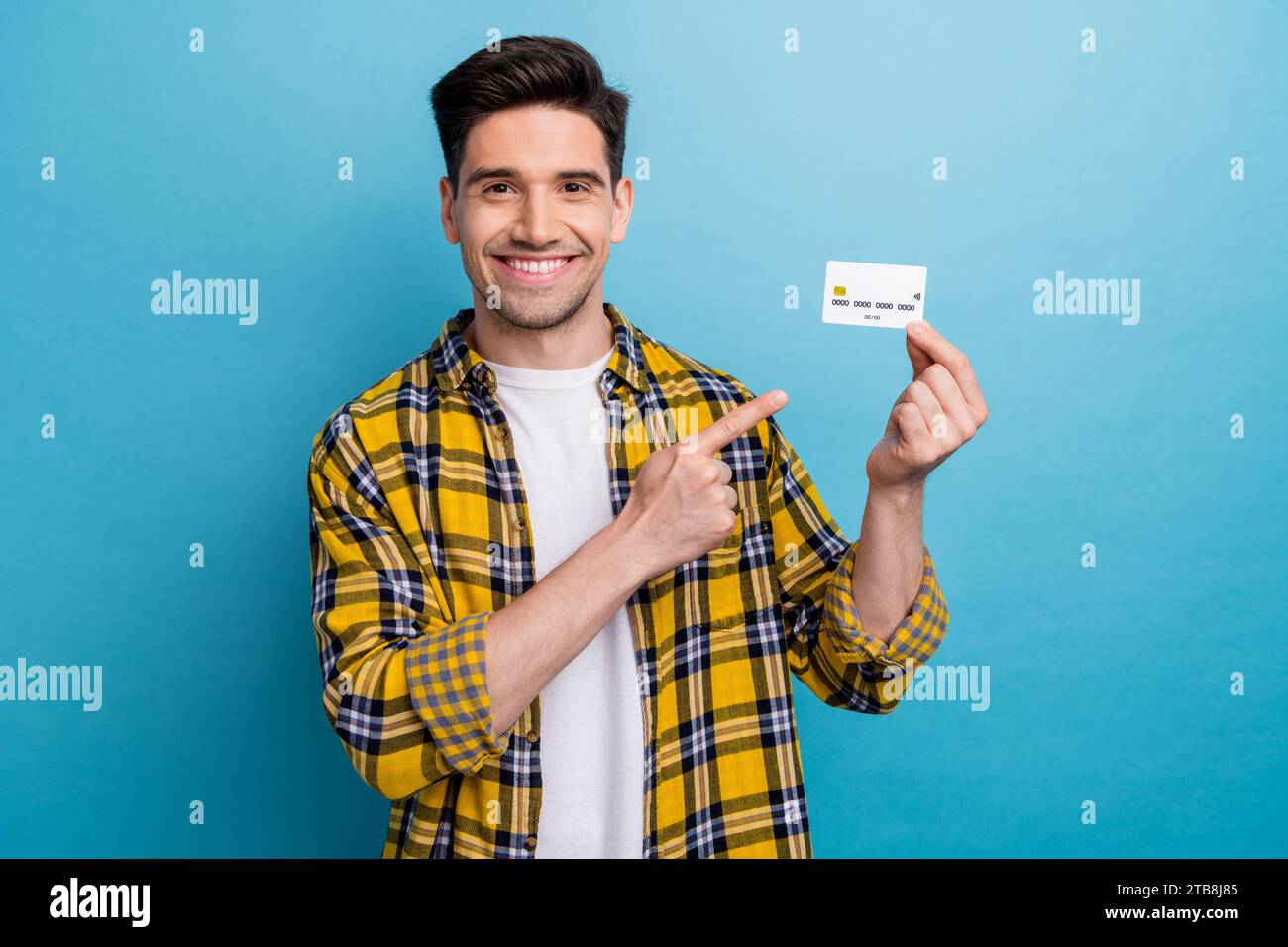 Portrait of toothy beaming optimistic guy with stubble wear checkered ...