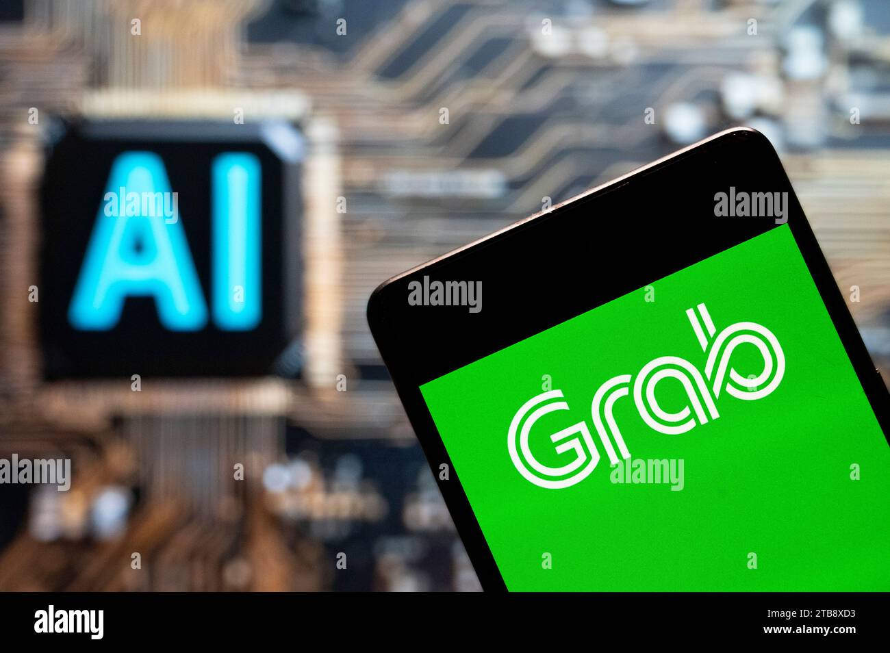 In this photo illustration, the Singapore technology ride-sharing and ...