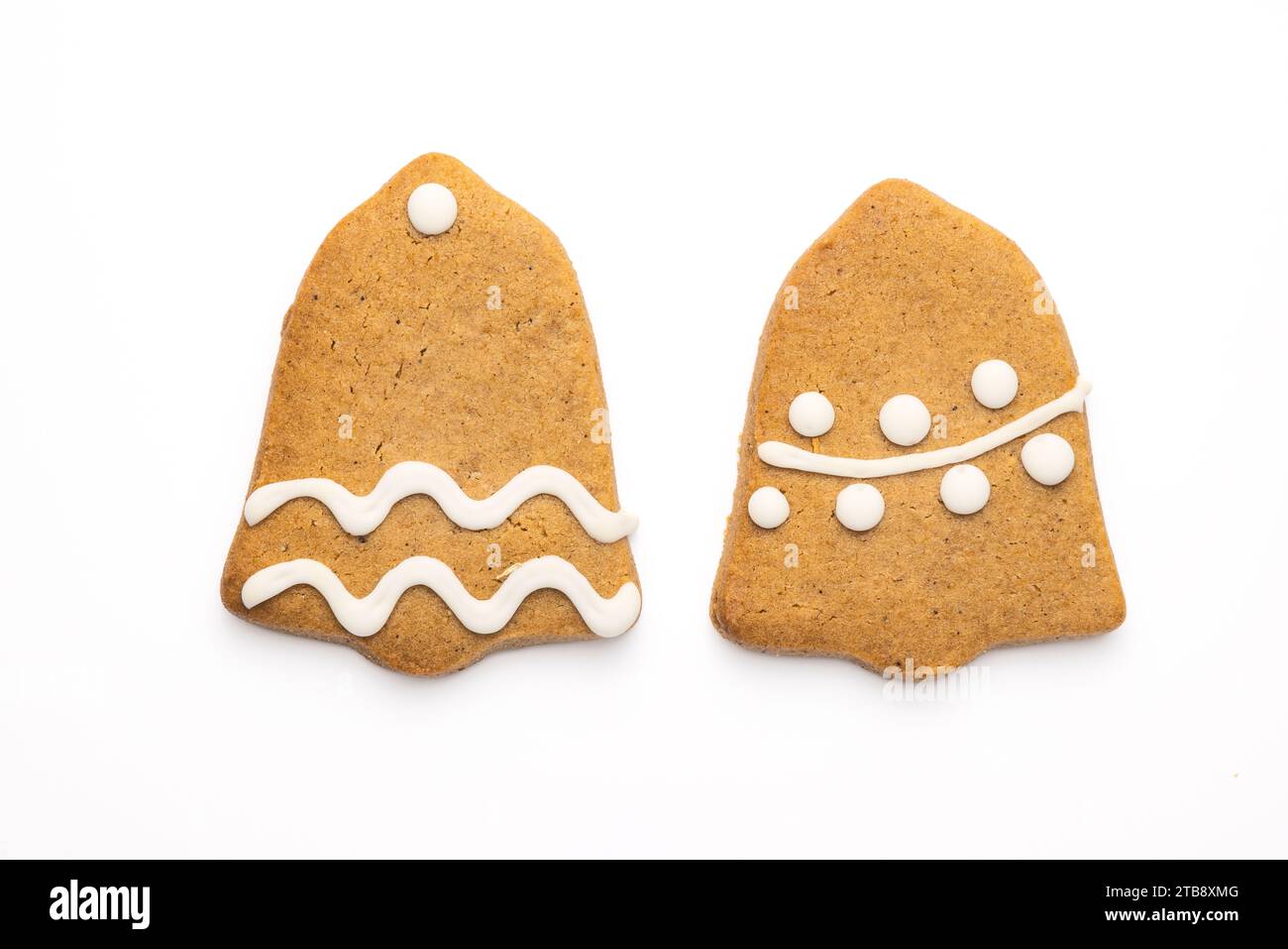 Gingerbread cookie of a Christmas bell with icing isolated on white ...
