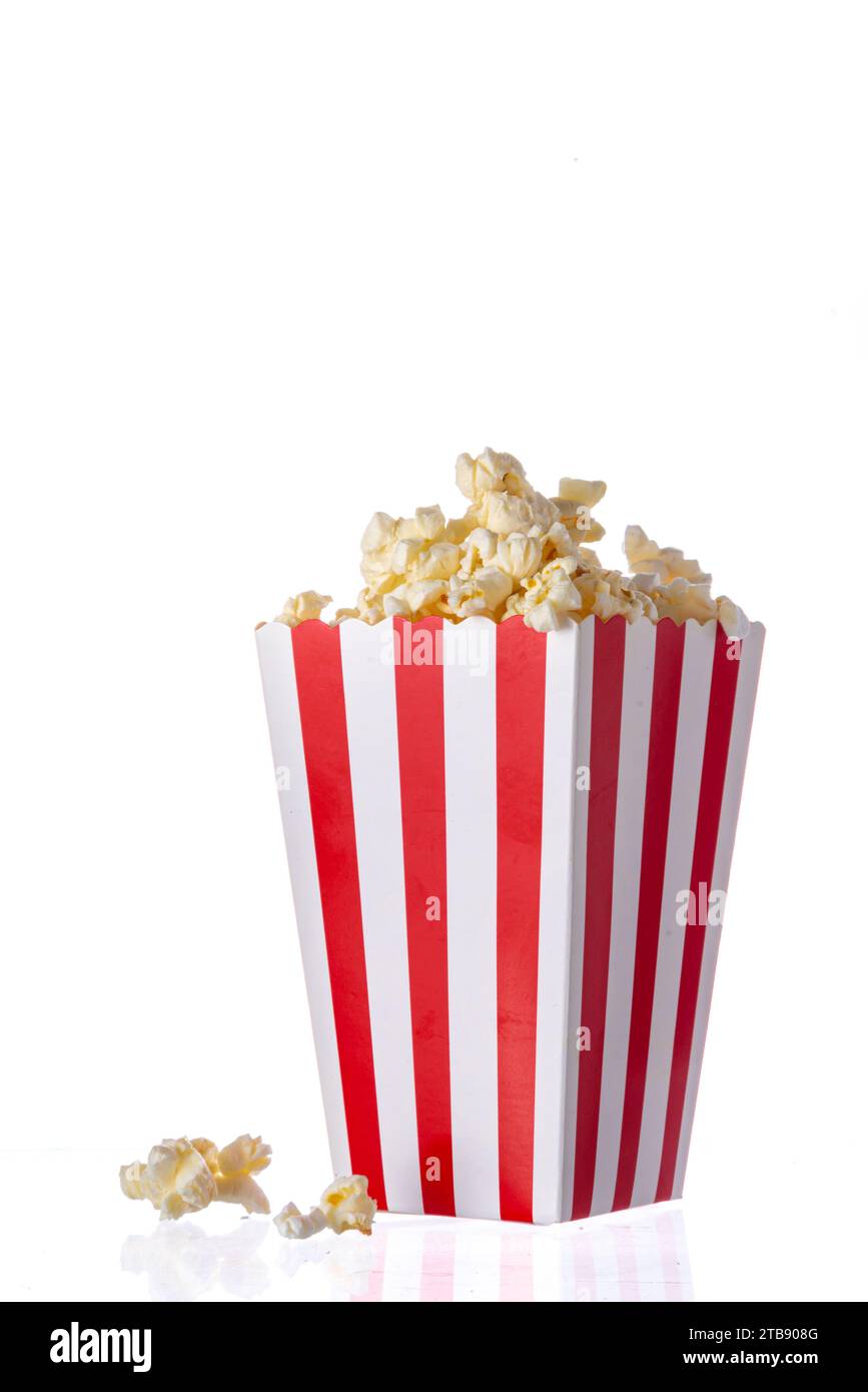 Popcorn bucket with movie clapperboard isolated on white background ...