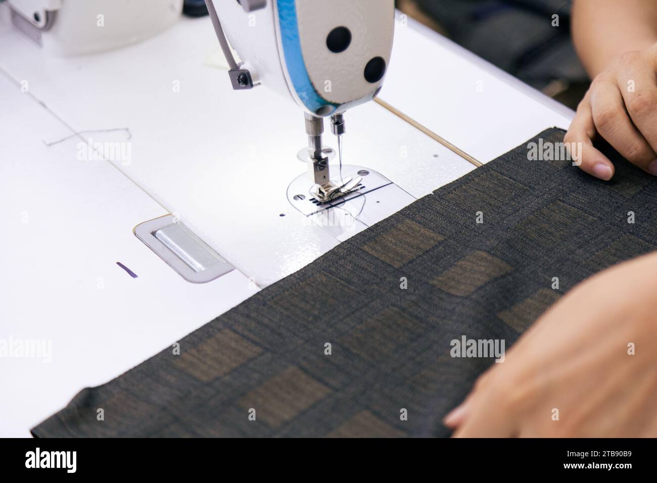 Working process garment factory sewing hi-res stock photography and ...