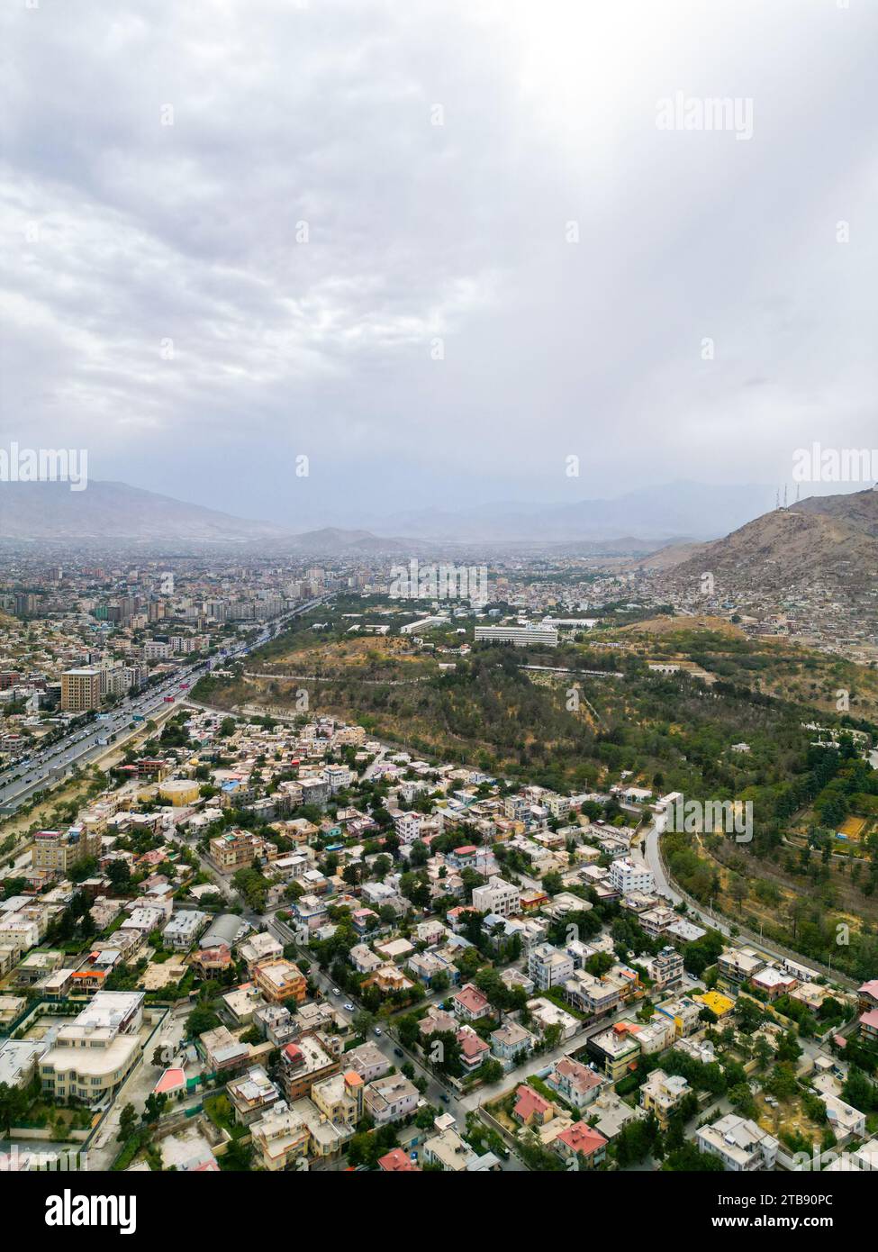 Aerial view of Kabul city Afghanistan. City road with cars and houses ...