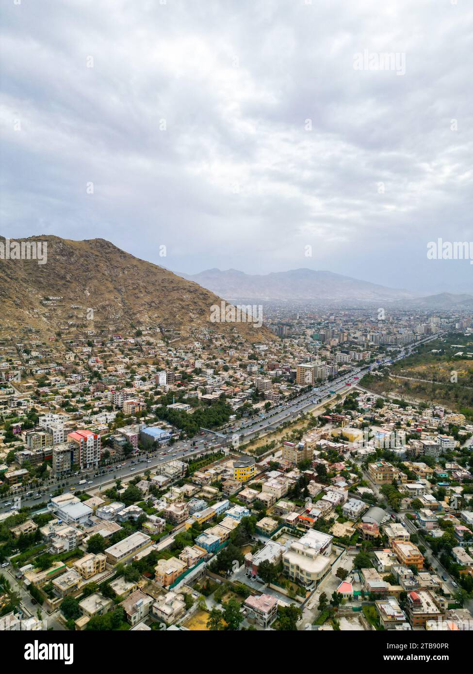 Aerial view of Kabul city Afghanistan. City road with cars and houses ...