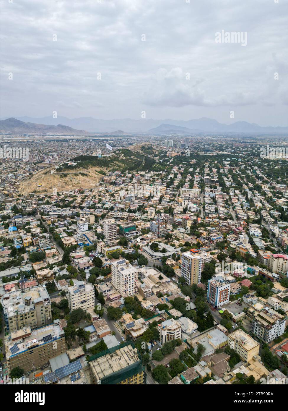 Aerial view of Kabul city Afghanistan. City road with cars and houses ...