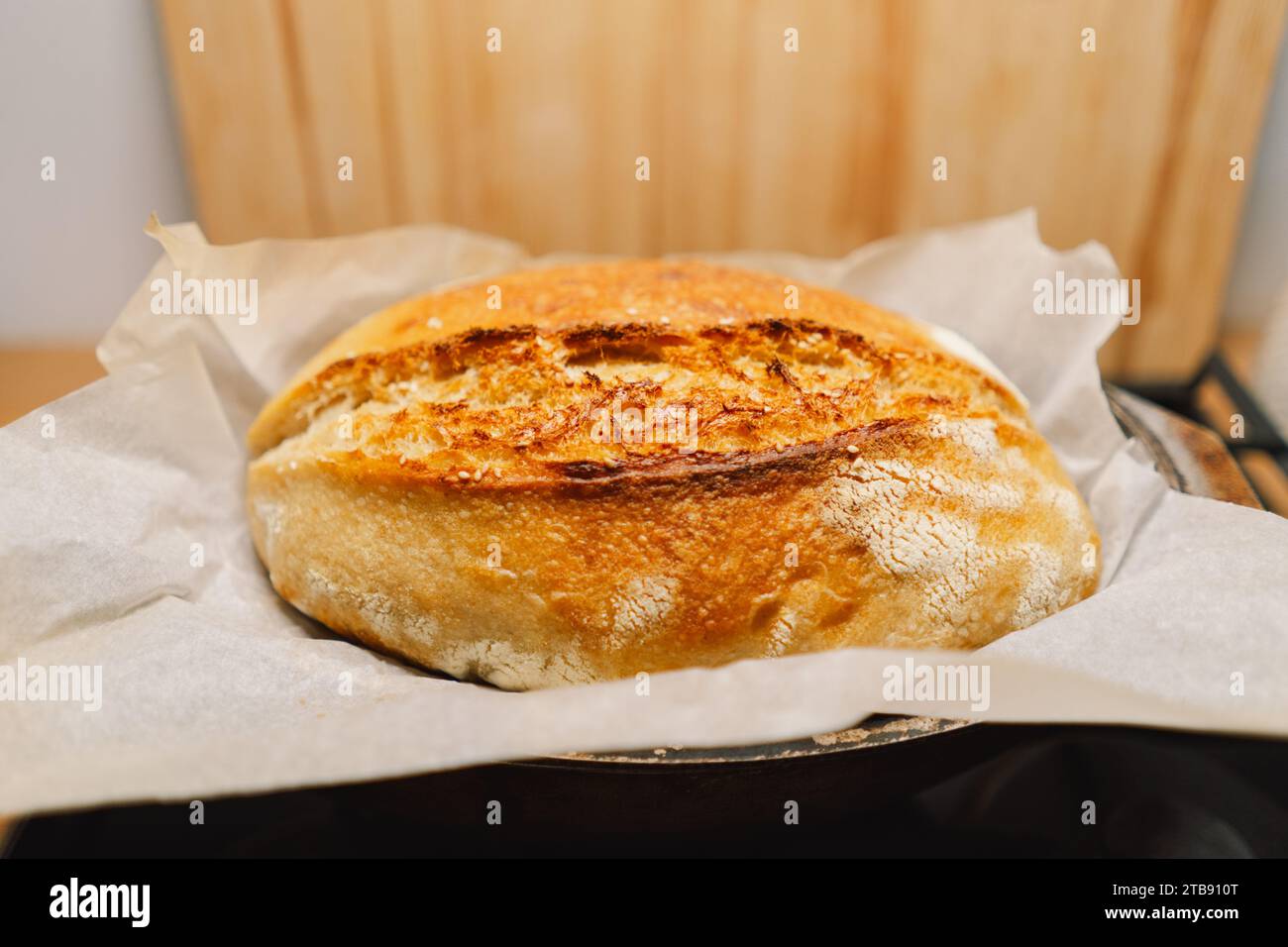 Fresh baked bread at home. Loaf of sourdough craft bread Stock Photo ...