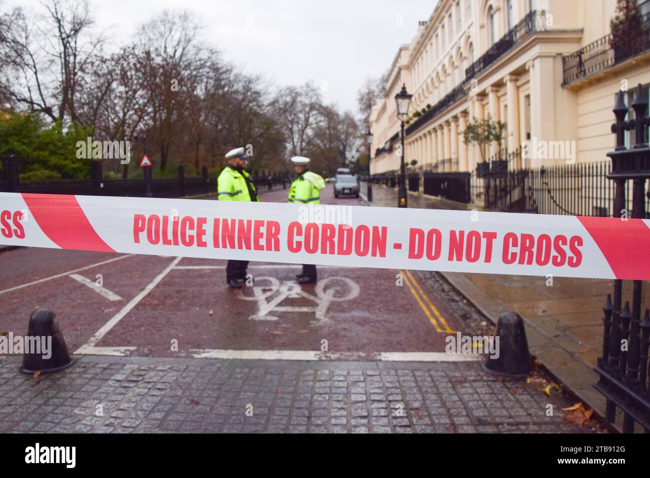 London, England, UK. 5th Dec, 2023. Police place a cordon as pro ...