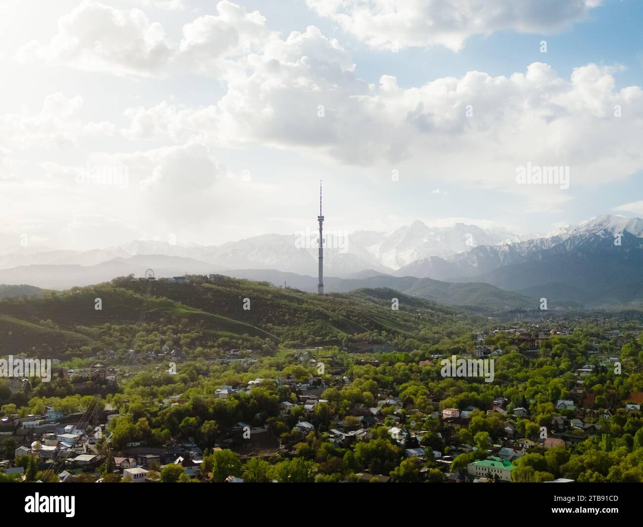 Aerial view of Almaty city with Television Tower during sunny spring ...