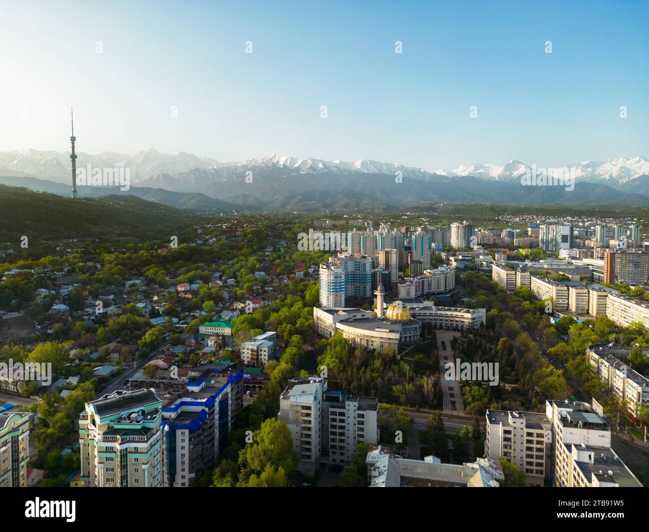 Aerial view of Almaty city with Television Tower during sunny spring ...