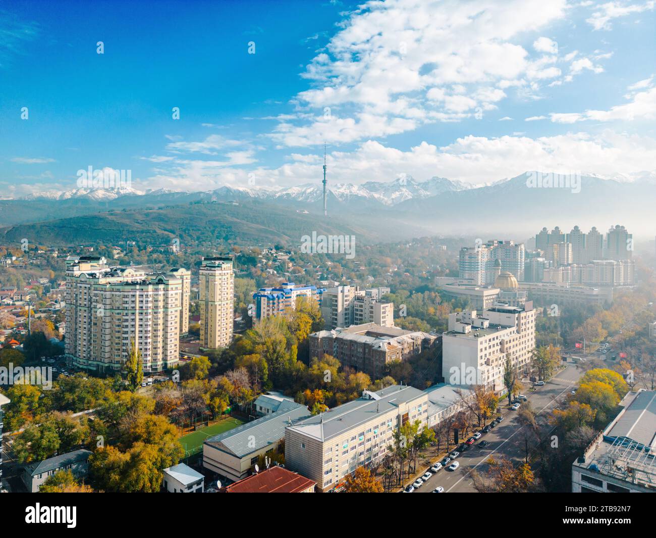 Aerial view of Almaty city with Television Tower during sunny day with ...