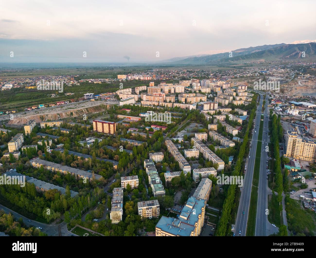 Aerial view of Bishkek city Kyrgyzstan with snowy mountains in the ...
