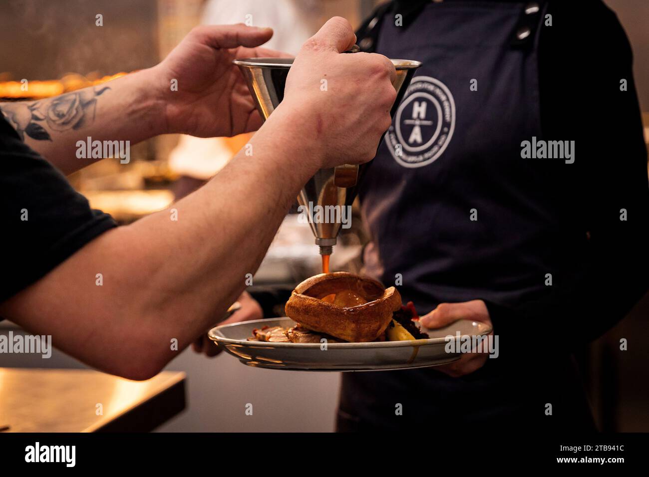 Behind the scenes in a restaurant kitchen Stock Photo - Alamy