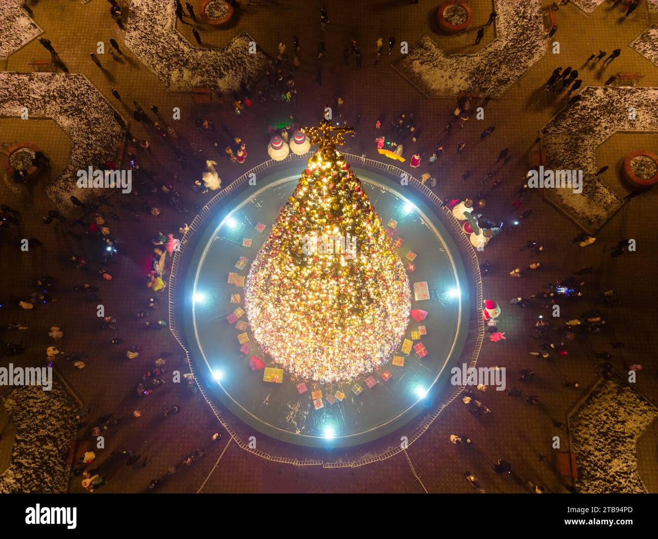 Aerial top down view of illuminated lights on a Christmas tree on a ...