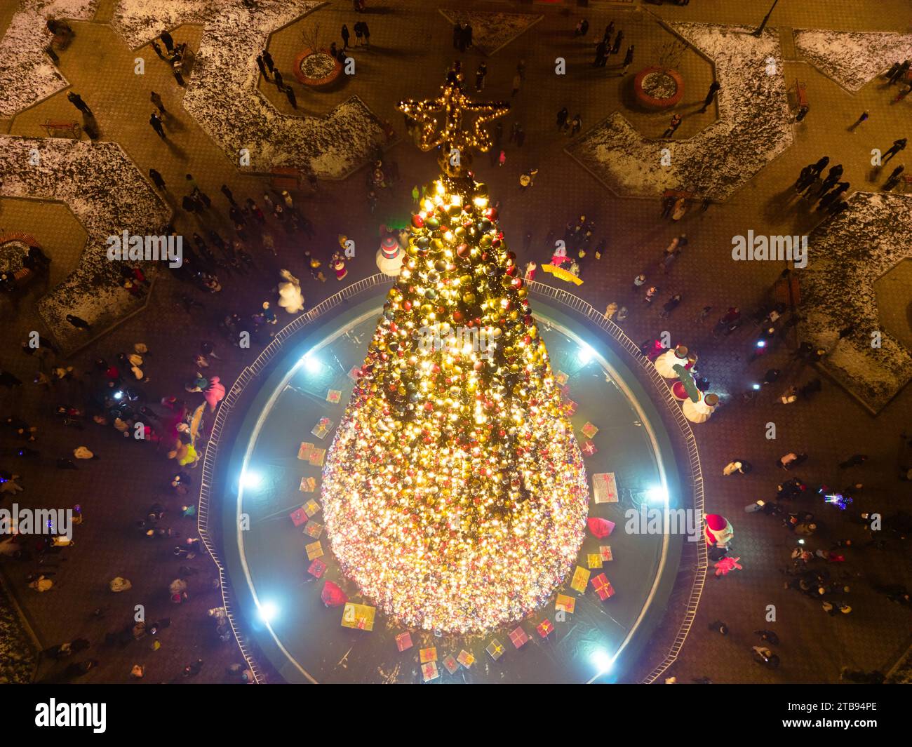 Aerial top down view of illuminated lights on a Christmas tree on a ...