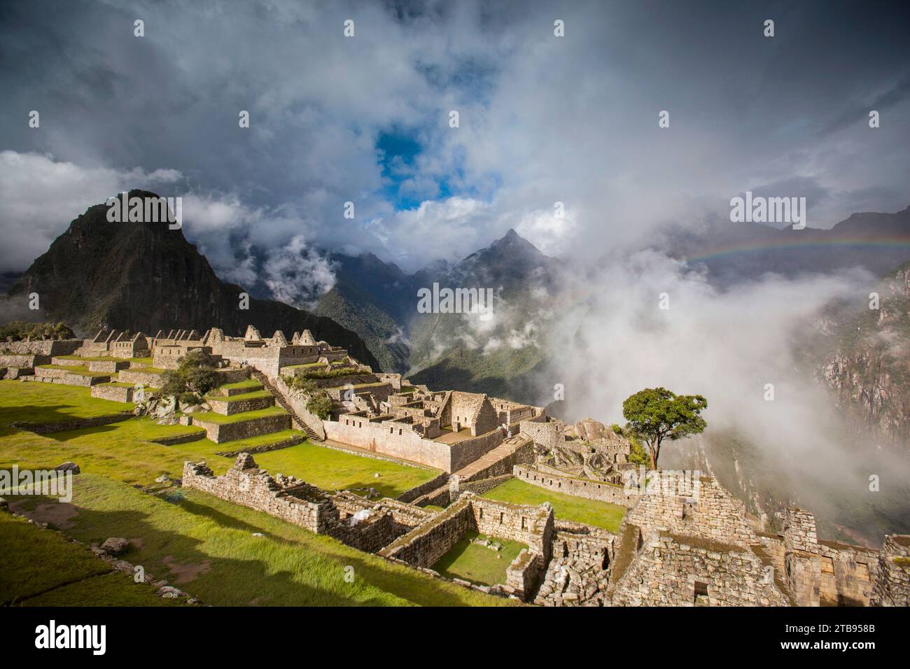 Rainbow emerges from the clouds over Machu Picchu; Peru Stock Photo - Alamy
