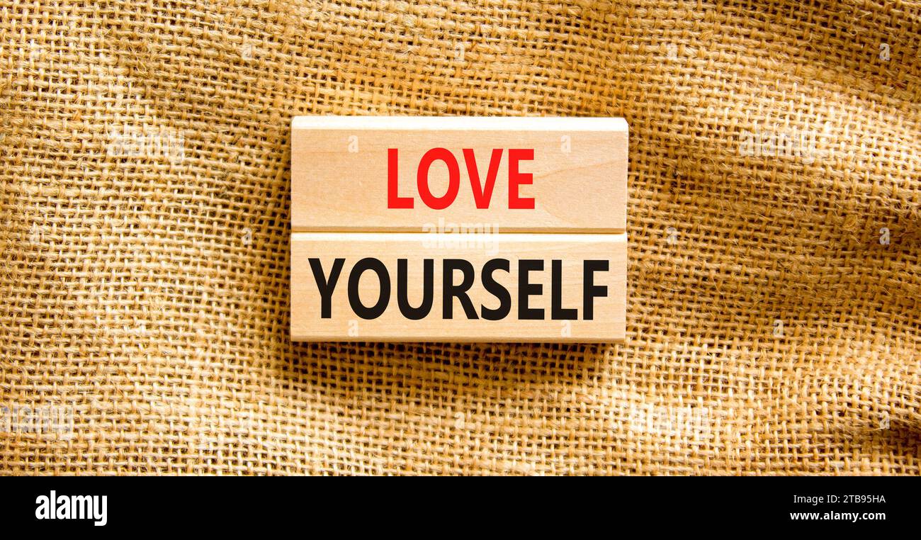Love yourself symbol. Concept words Love yourself on beautiful wooden ...