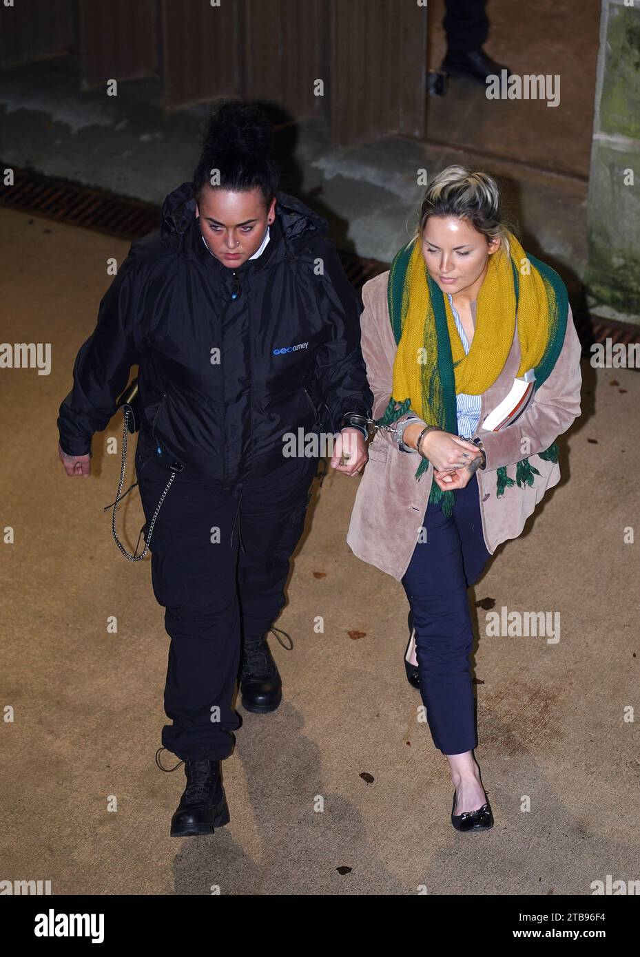 Alice wood (right) leaves chester crown court during her trial, she is ...