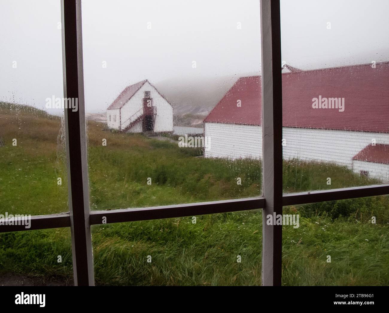 Buildings seen through a window, in the fishing outpost of Battle ...