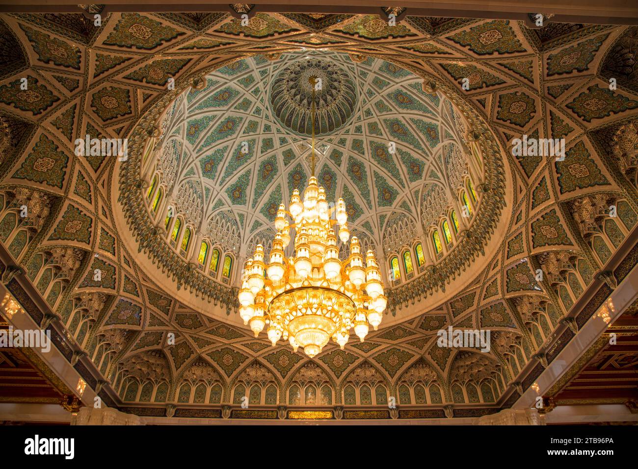 Chandelier above the praying hall inside the Sultan Qaboos Grand Mosque ...