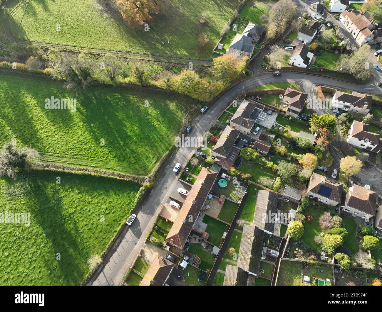 Aerial drone view over Wallycourt Road, in the village of Chew Stoke ...