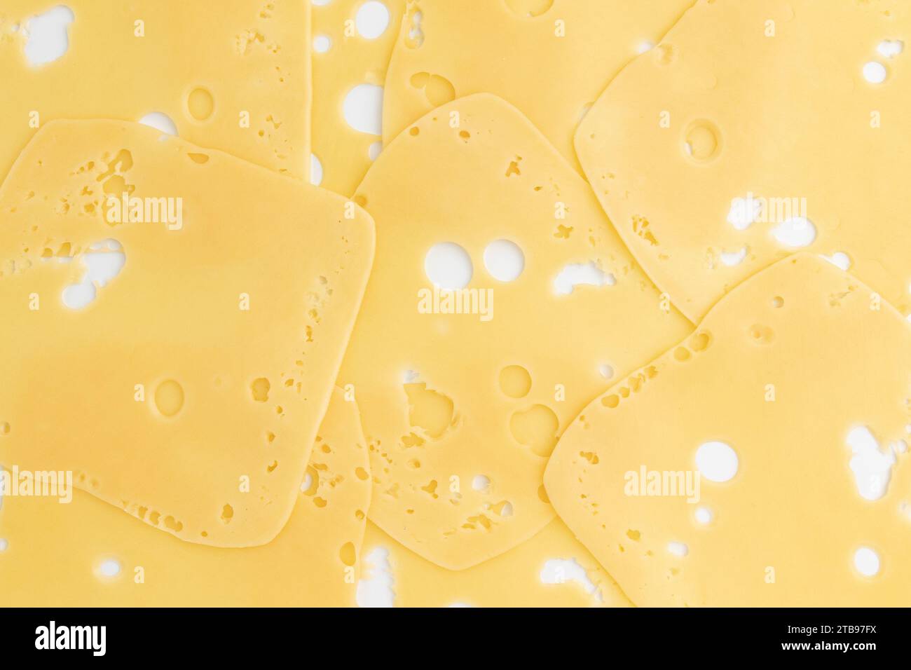 cheese texture, background of fresh yellow cheese with holes, print of ...
