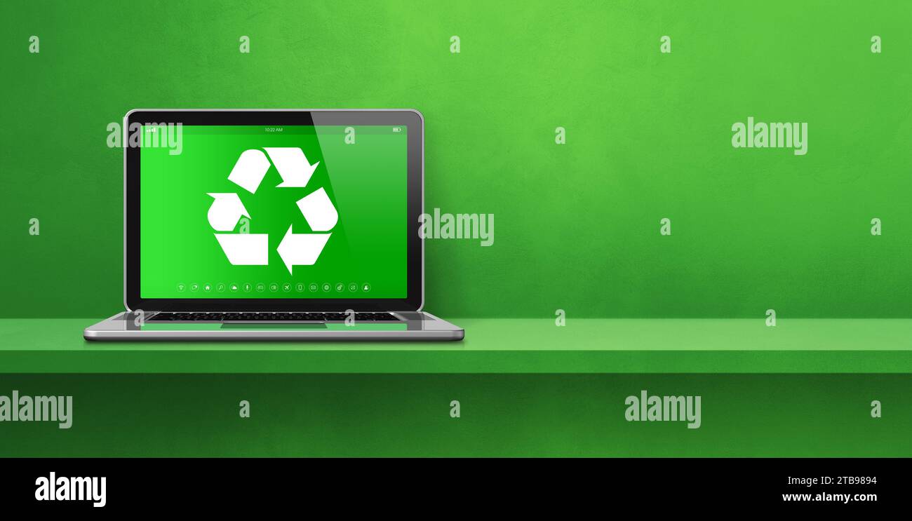 Laptop computer on a shelf with a recycling symbol on screen ...