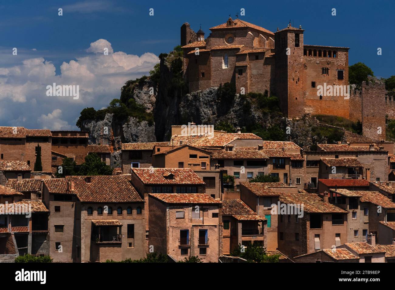 A church built in the 1500s surmounts a Moorish citadel and rises above ...