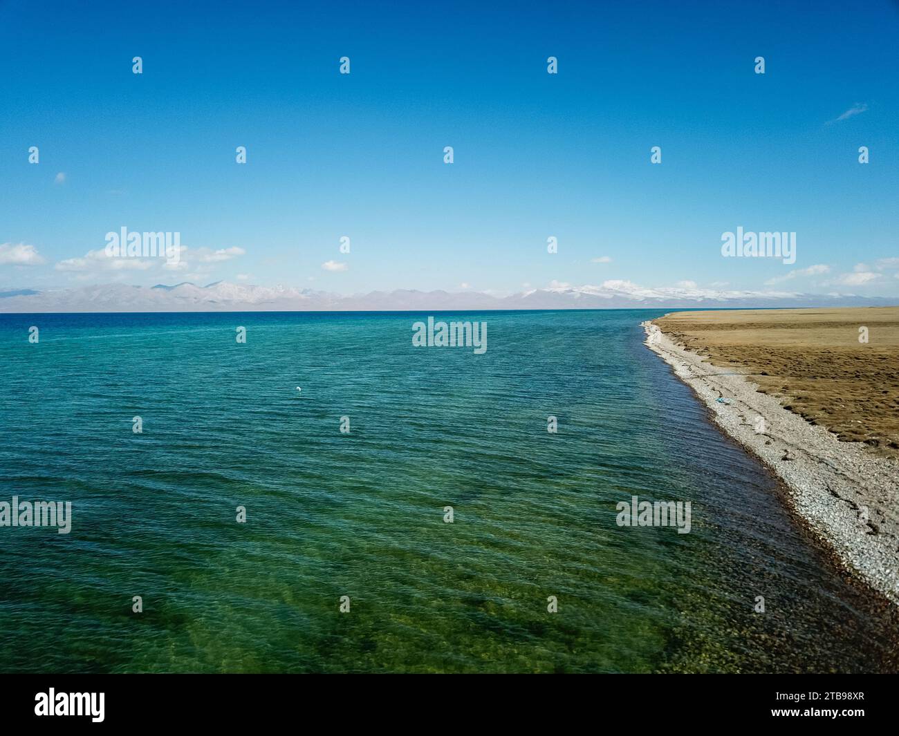 Aerial view of beautiful mountain Song-Kul lake in Kyrgyzstan with ...